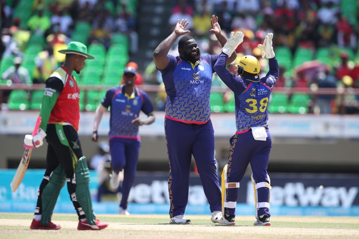 Rakheem Cornwall celebrates a wicket with Devon Thomas | ESPNcricinfo.com
