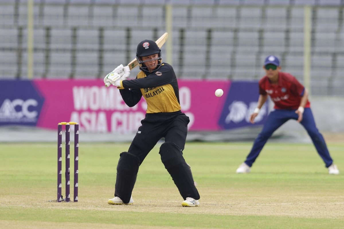 Elsa Hunter of Malaysia prepares to hit the ball | ESPNcricinfo.com