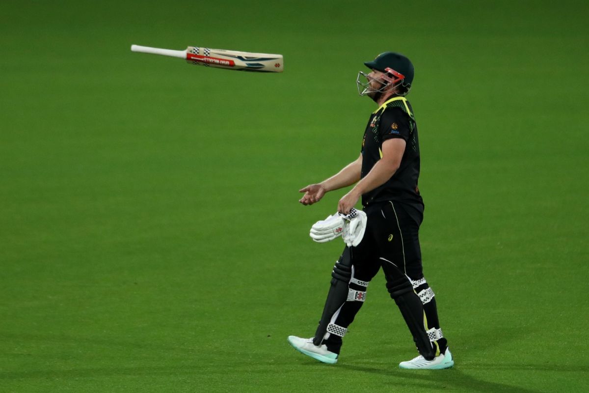 Aaron Finch tosses his bat in frustration after falling cheaply ...