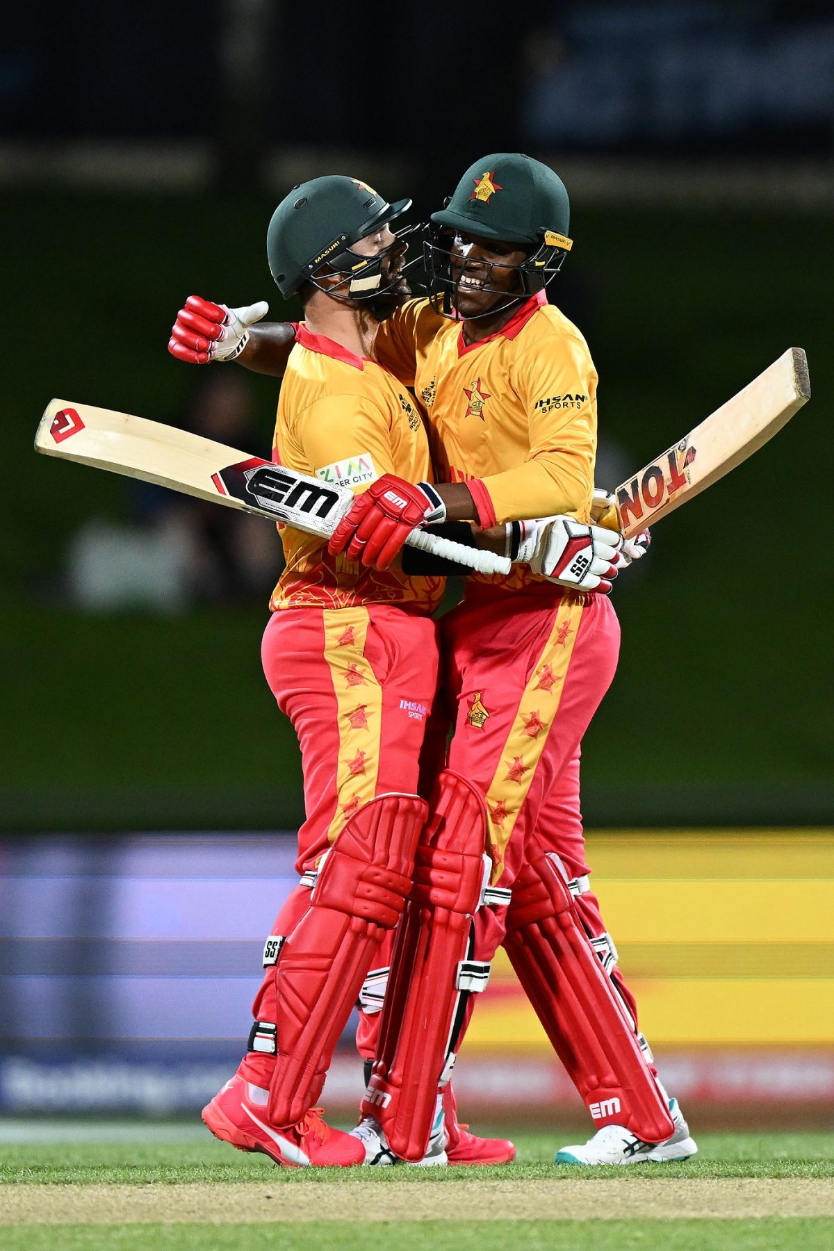Ryan Burl hugs Milton Shumba after hitting the winning runs ...