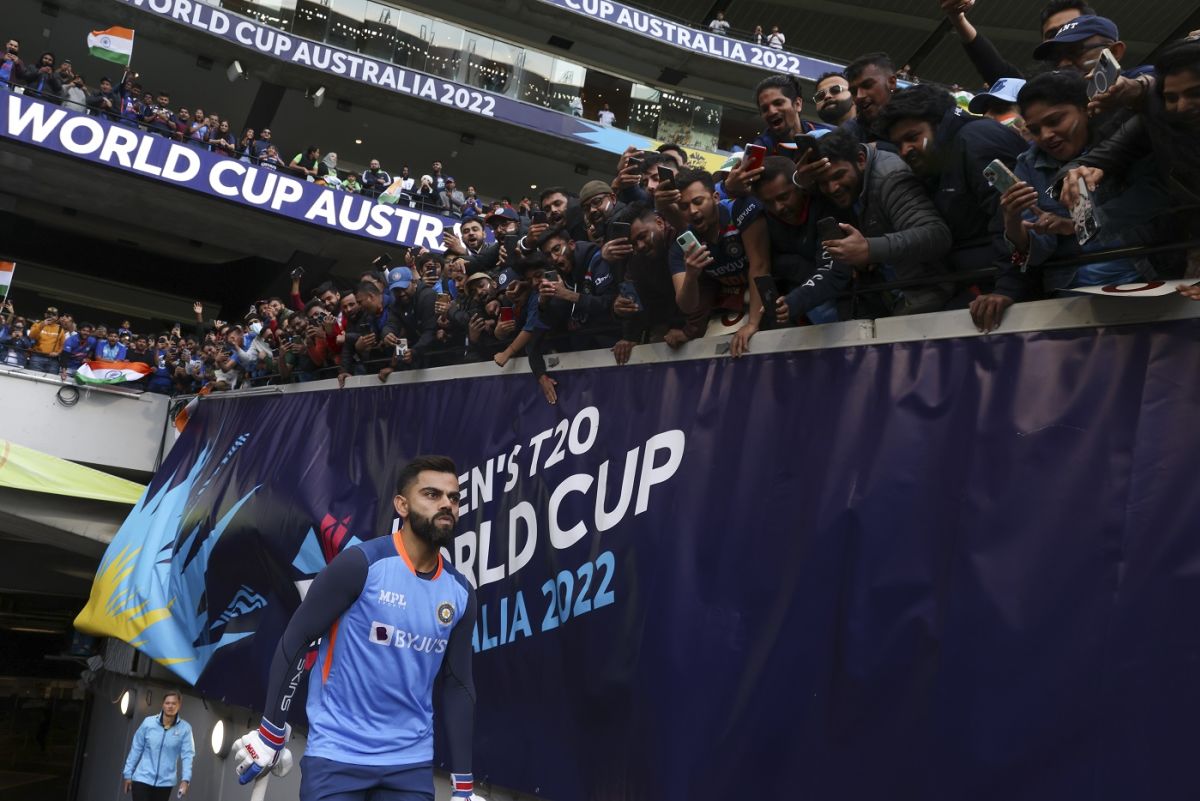 Virat Kohli walks onto the field | ESPNcricinfo.com