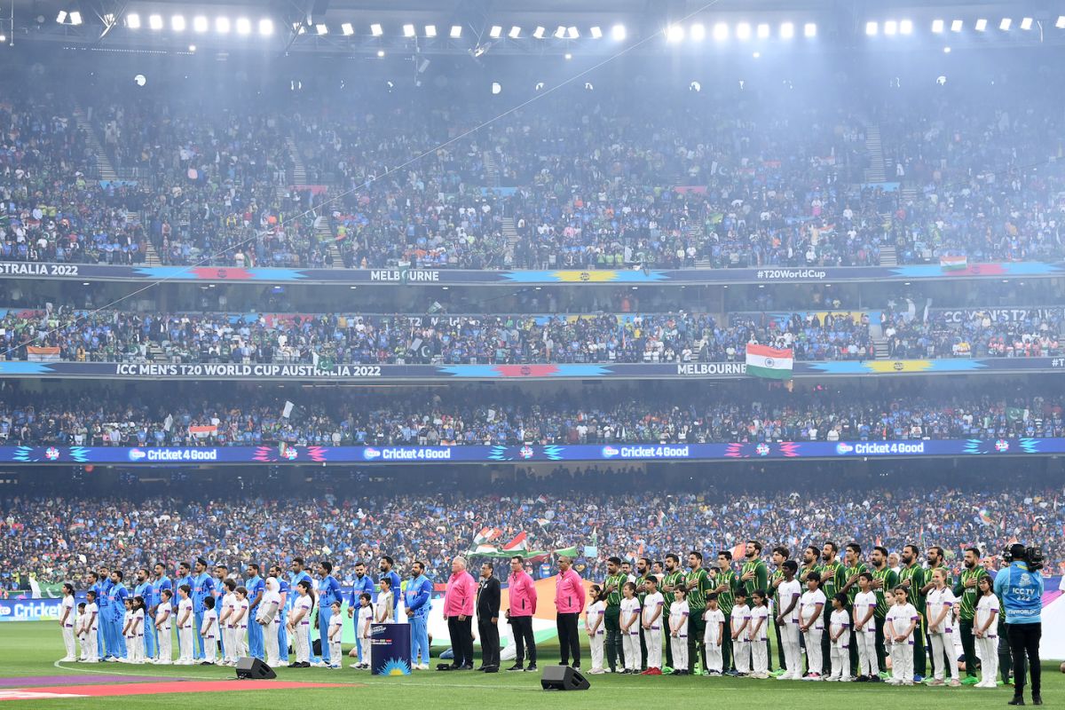 India and Pakistan line up for the national anthems at a packed MCG ...