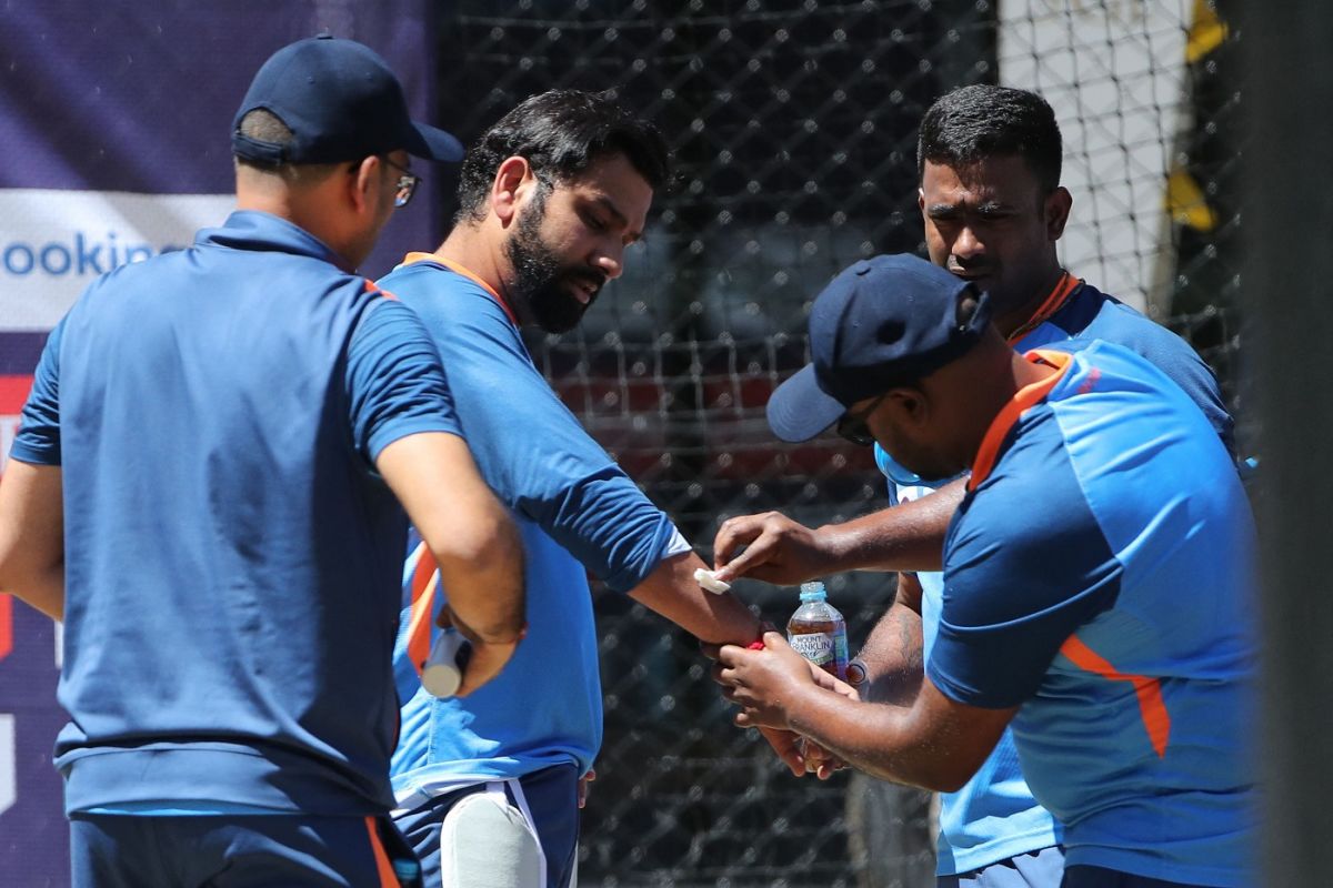Rohit Sharma receives medical attention after being hit on the forearm ... Rohit Sharma receives medical attention after being hit on the forearm ...