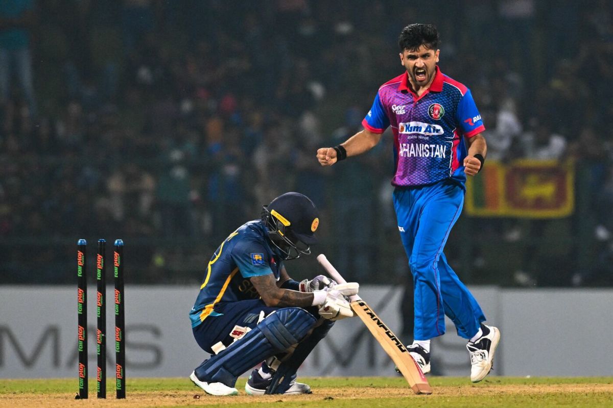 Fazalhaq Farooqi is flying after bowling Dinesh Chandimal ...