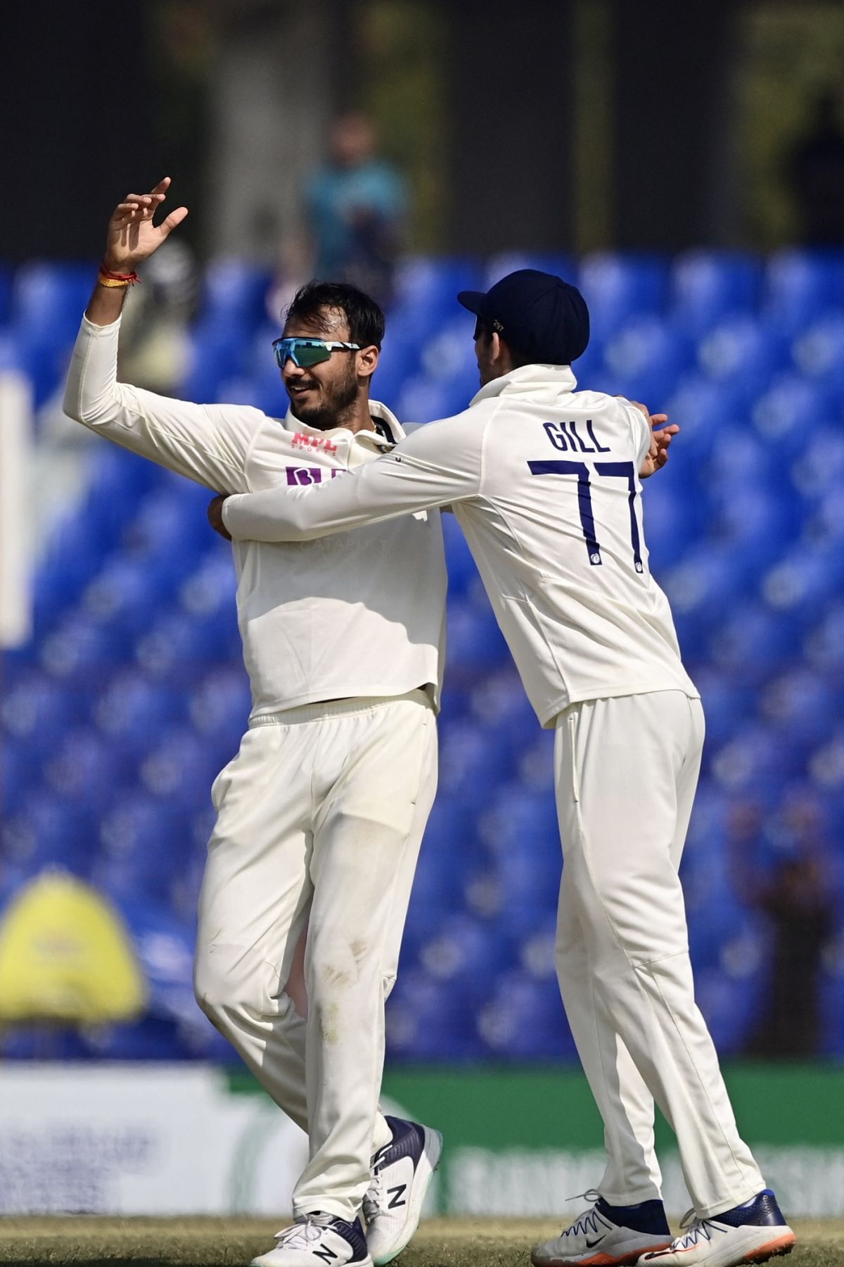 Axar Patel celebrates with Shubman Gill the dismissal of Yasir Ali ...
