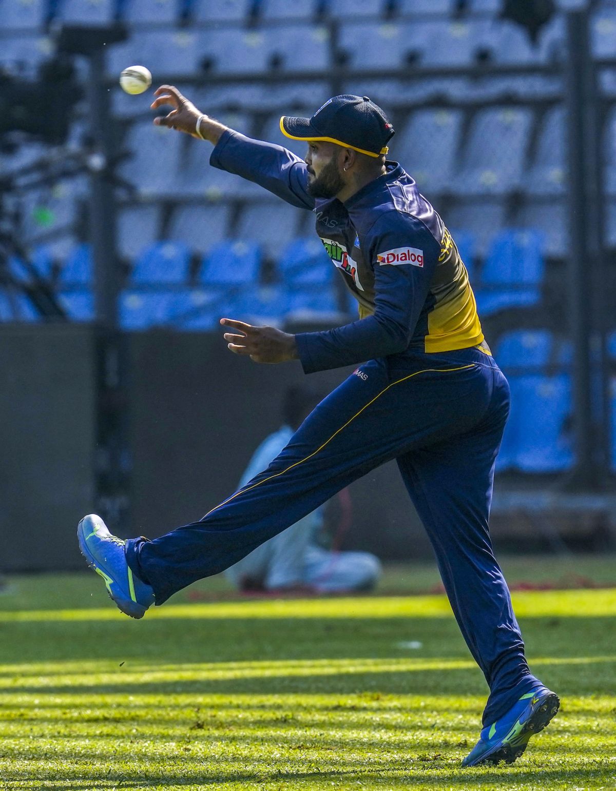 Wanindu Hasaranga takes a breather during a training session ...