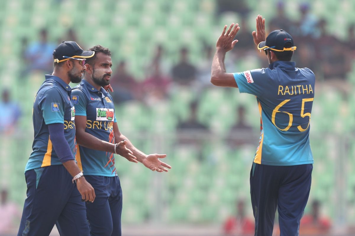 Chamika Karunaratne celebrates after dismissing an on-song Rohit Sharma ...