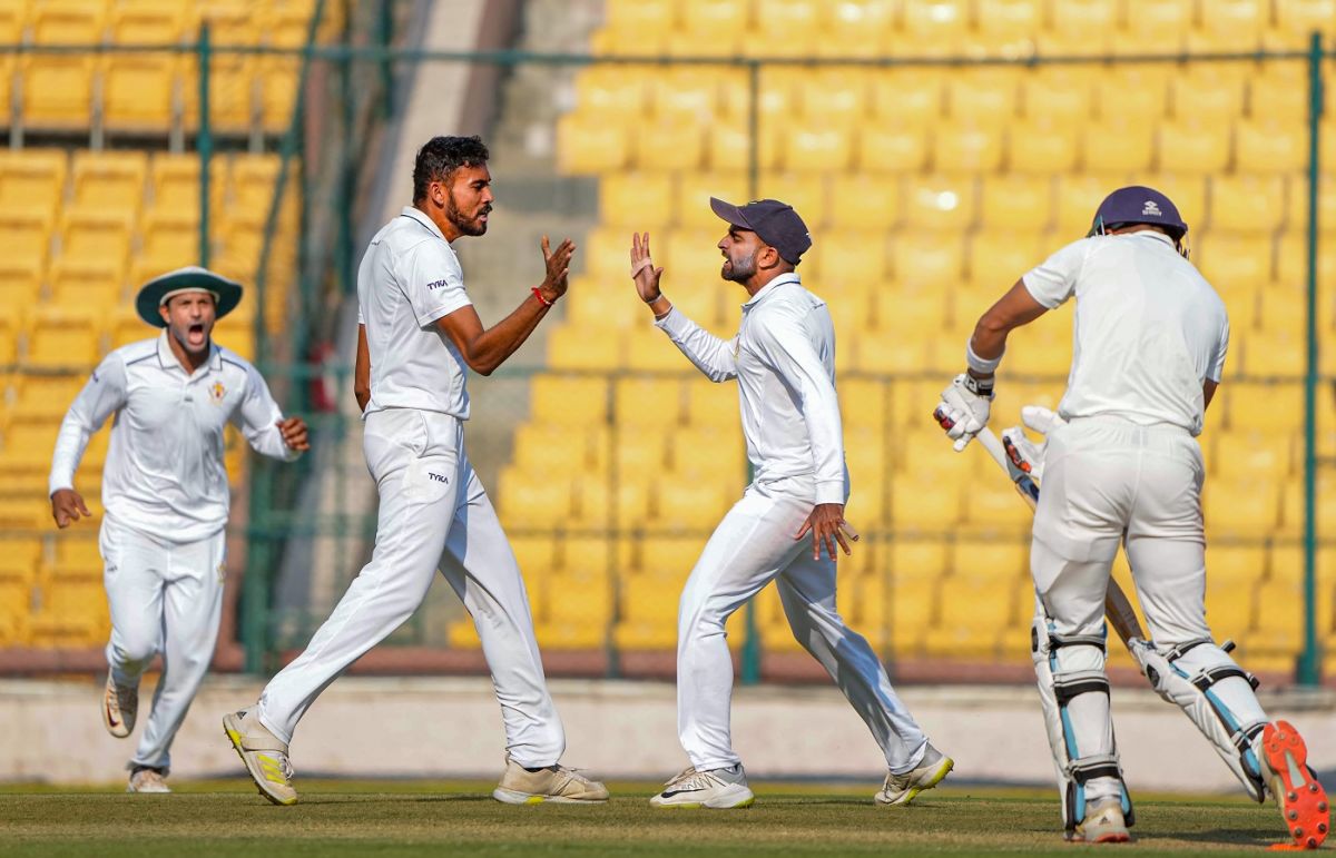 Vidwath Kaverappa celebrates the wicket of Vishvaraj Jadeja ...