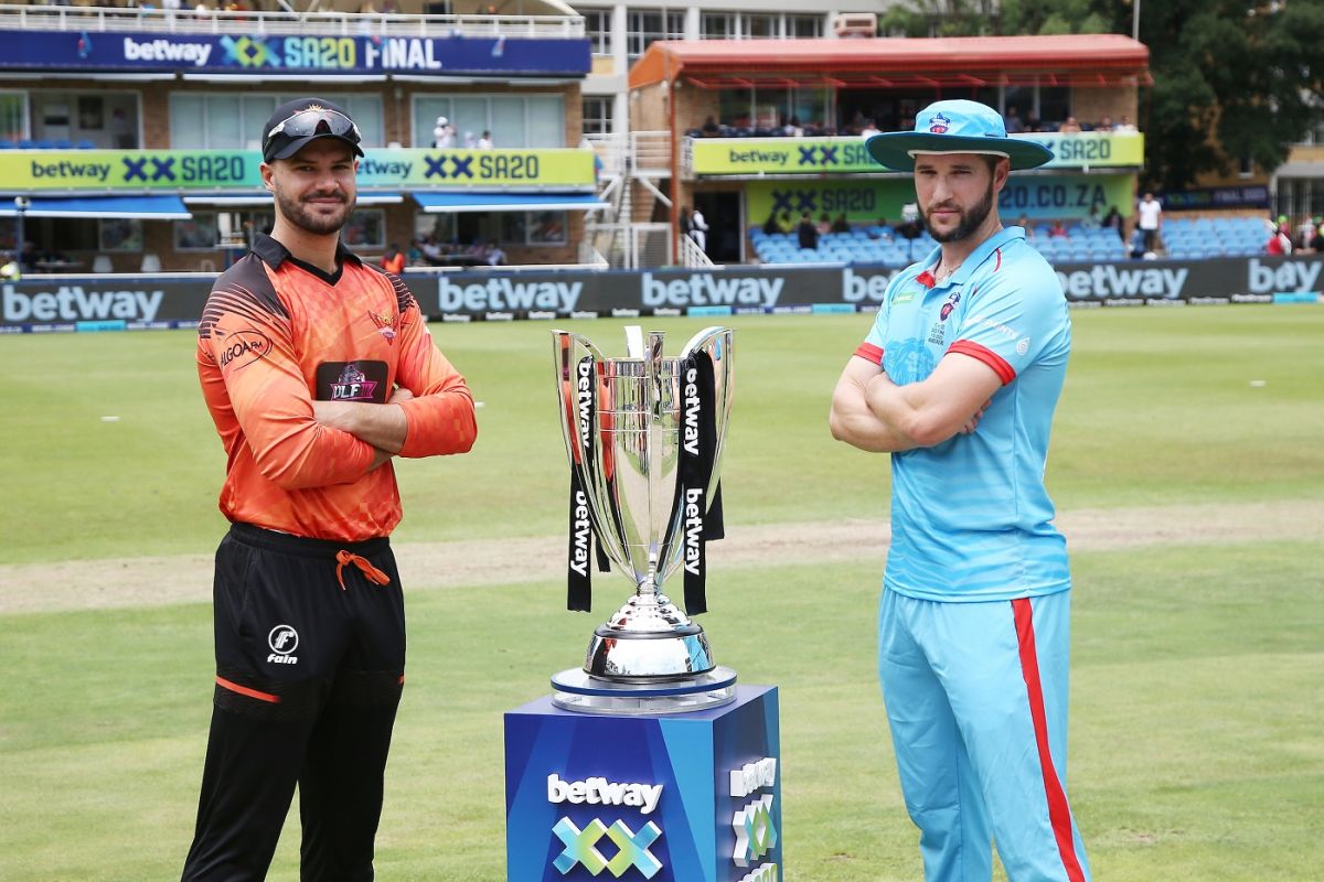 Aiden Markram and Wayne Parnell pose with the SA20 trophy ...