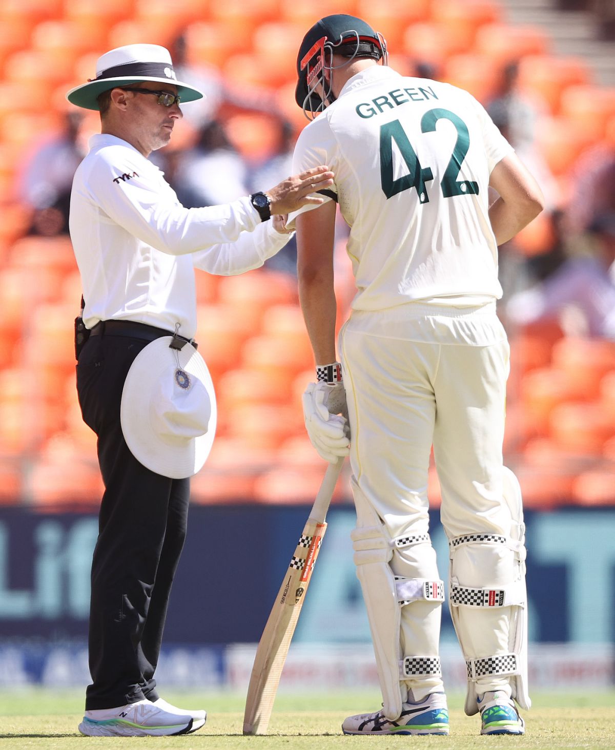 Umpire Richard Kettleborough adjusts the armband - worn by all the ...