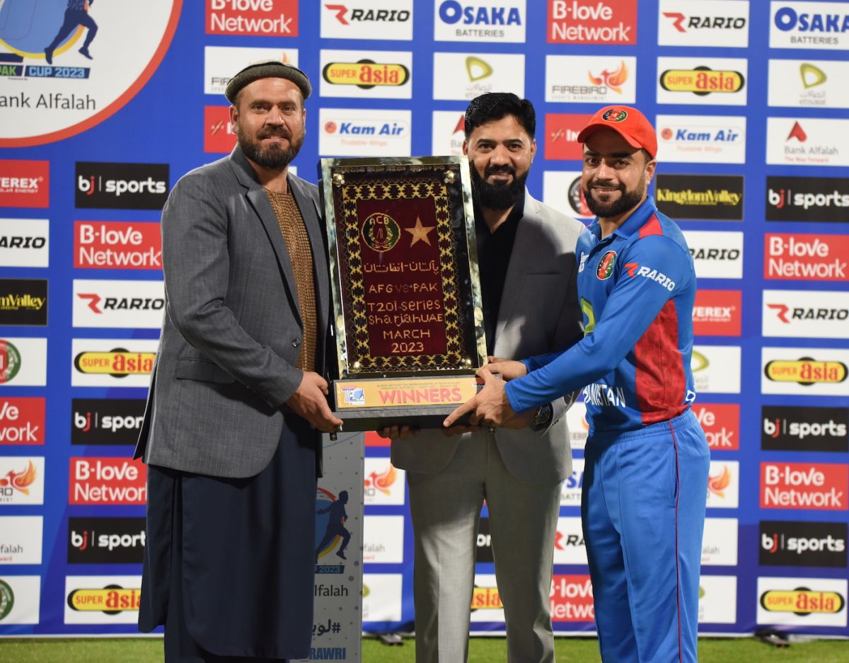 The Afghanistan players pose with the trophy | ESPNcricinfo.com