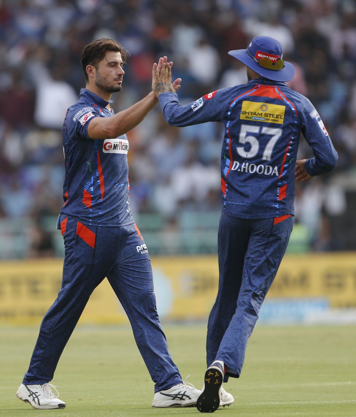 KL Rahul and Hardik Pandya look to shield themselves from the heat at the toss | ESPNcricinfo.com