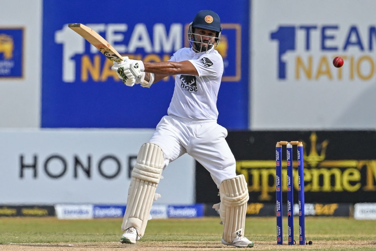 Dimuth Karunaratne and Lorcan Tucker watch the ball and Harry Tector ...
