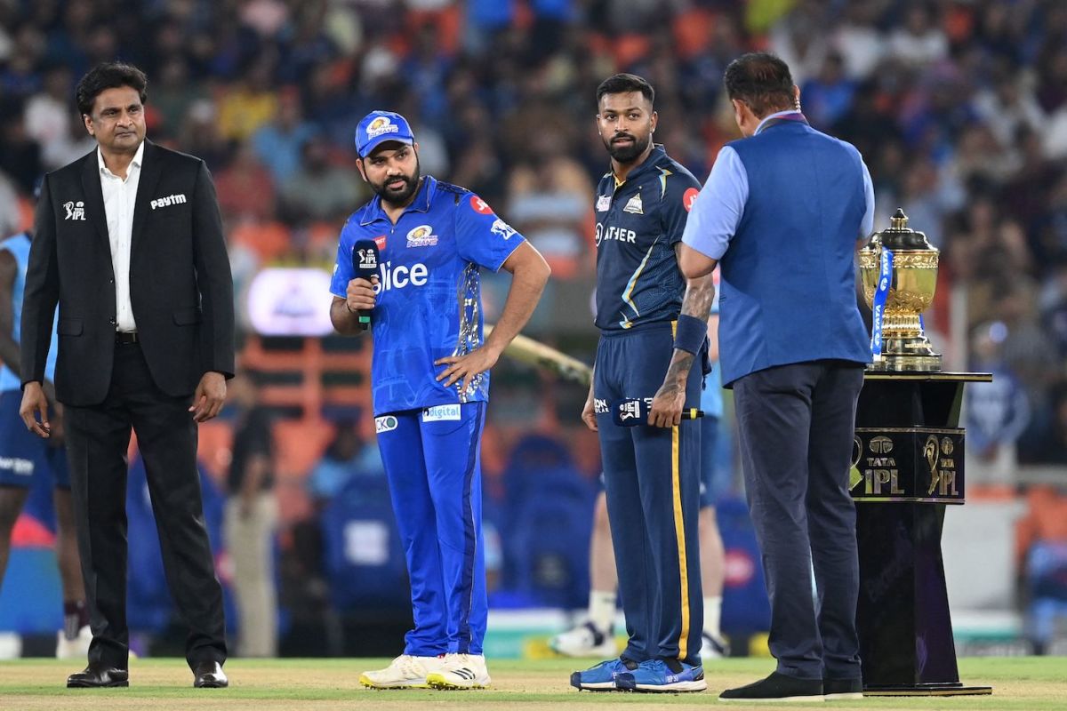 Hardik Pandya and Rohit Sharma pose with the IPL trophy at the toss ...