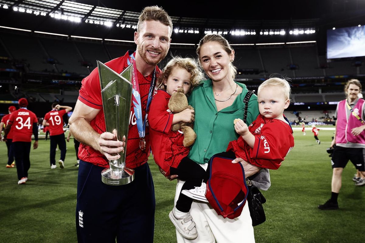 Jos Buttler poses with the T20 World Cup trophy at Brighton Beach the morning after winning the ...