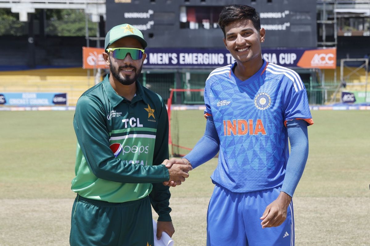 Mohammad Haris and Yash Dhull, flanked by Sana Mir and match referee ...