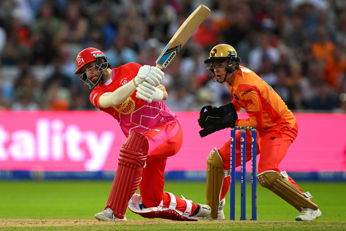 Andrew Umeed celebrates his century with team-mate Curtis Campher ...
