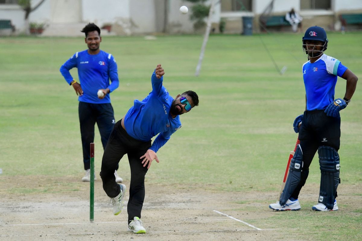 Dipendra Singh Airee loops one up during training | ESPNcricinfo.com
