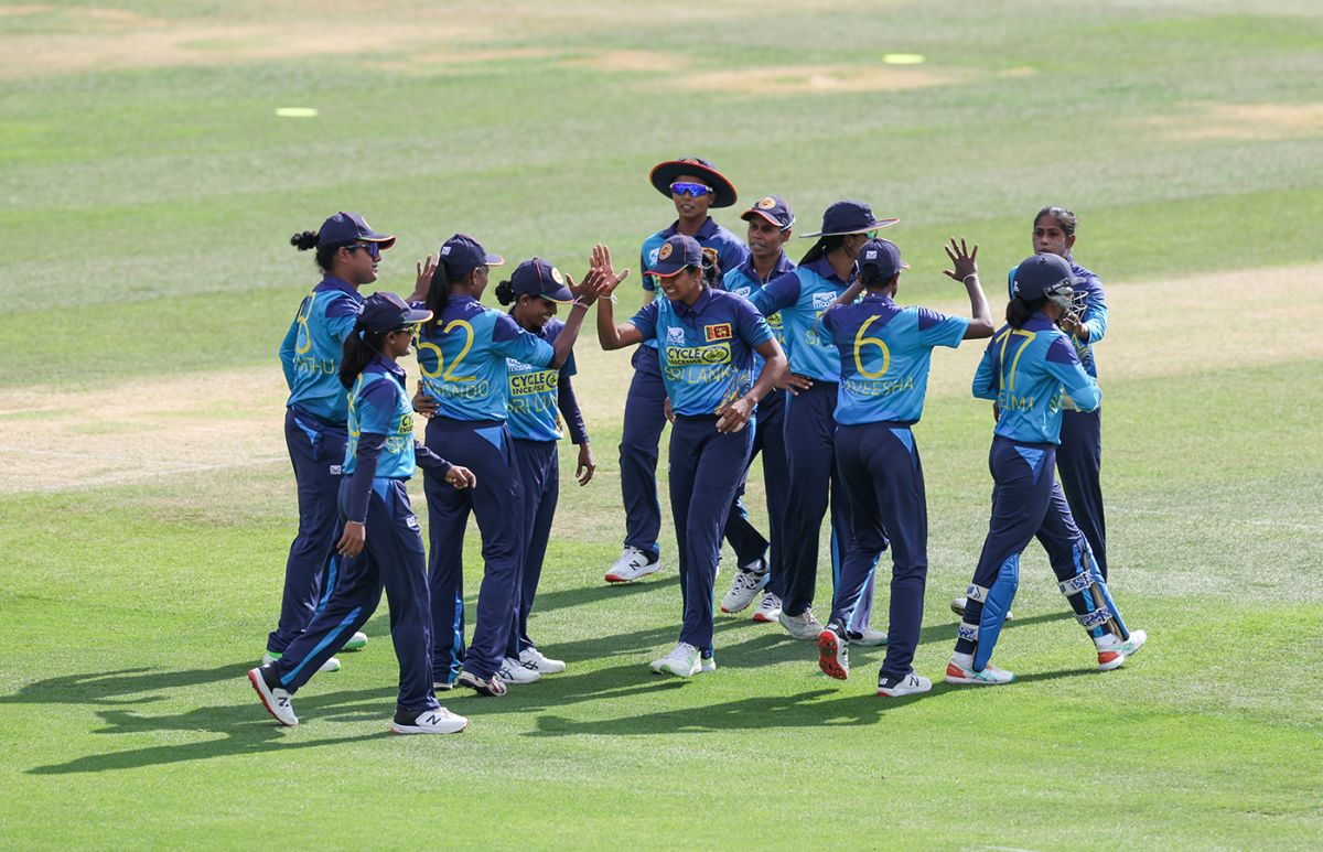 Inoshi Fernando celebrates taking the wicket of Danielle Gibson ...