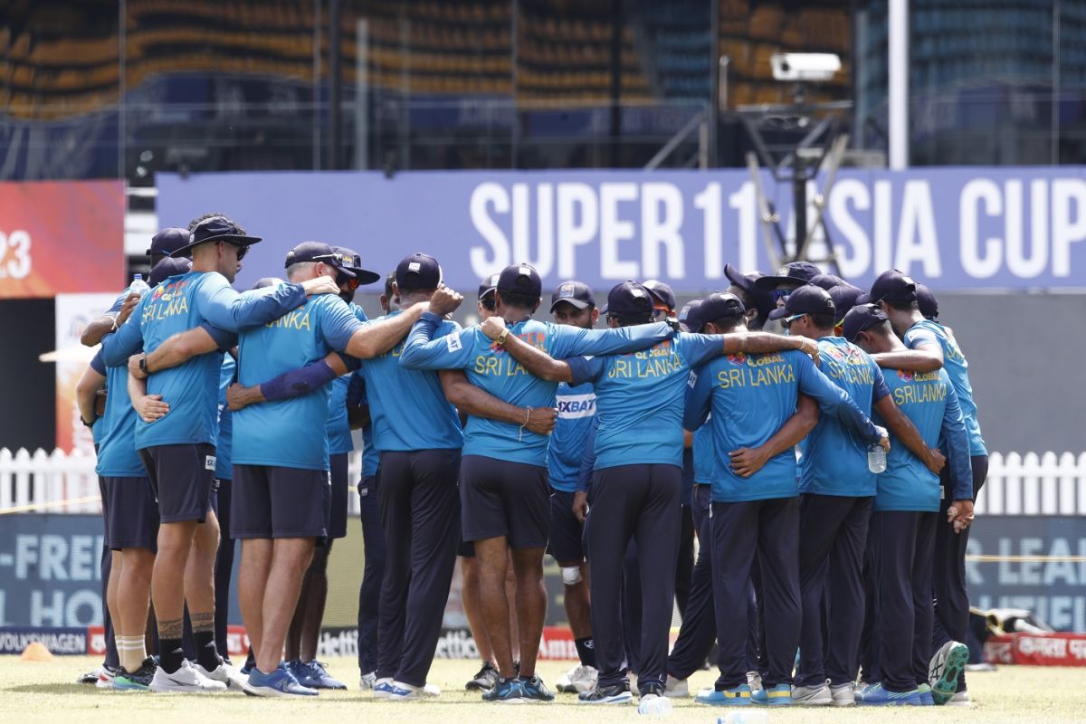 Sri Lanka's players huddle up before the start of their game against ...