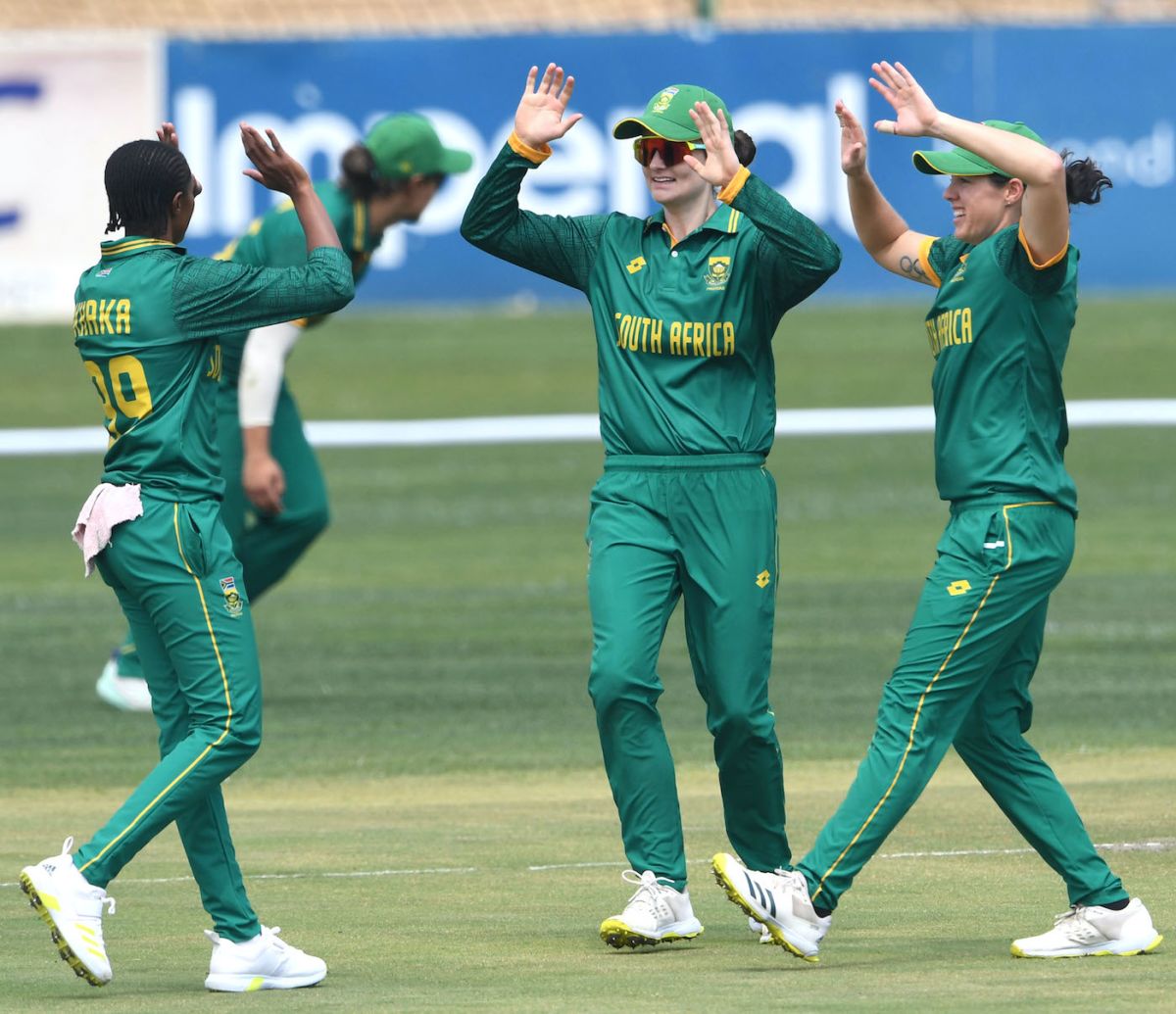 Ayabonga Khaka celebrates with Laura Wolvaardt and Tazmin Brits ...