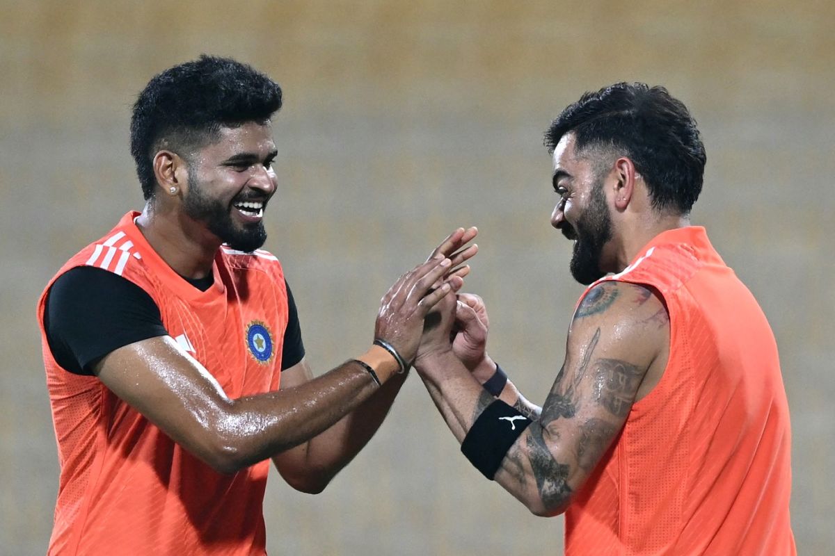 Shreyas Iyer and Virat Kohli share a light moment during practice ... Shreyas Iyer and Virat Kohli share a light moment during practice ...