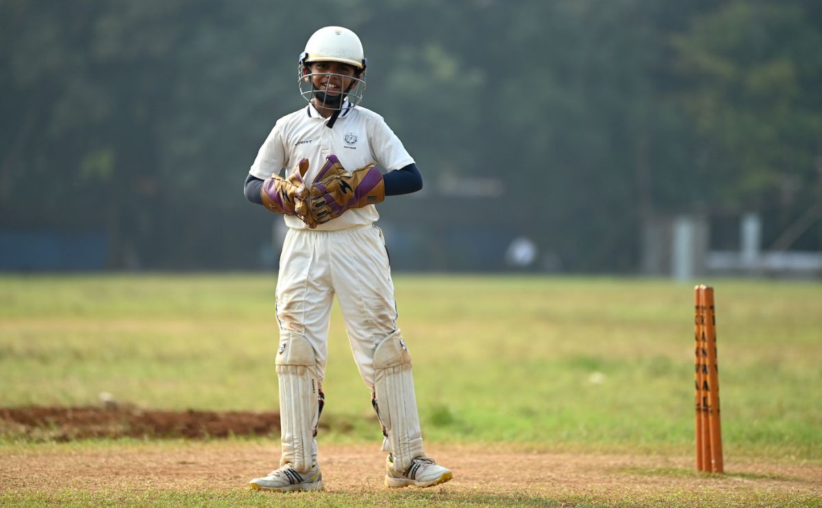 On the up, through cover goes a kid at Mumbai's Azad Maidan ...