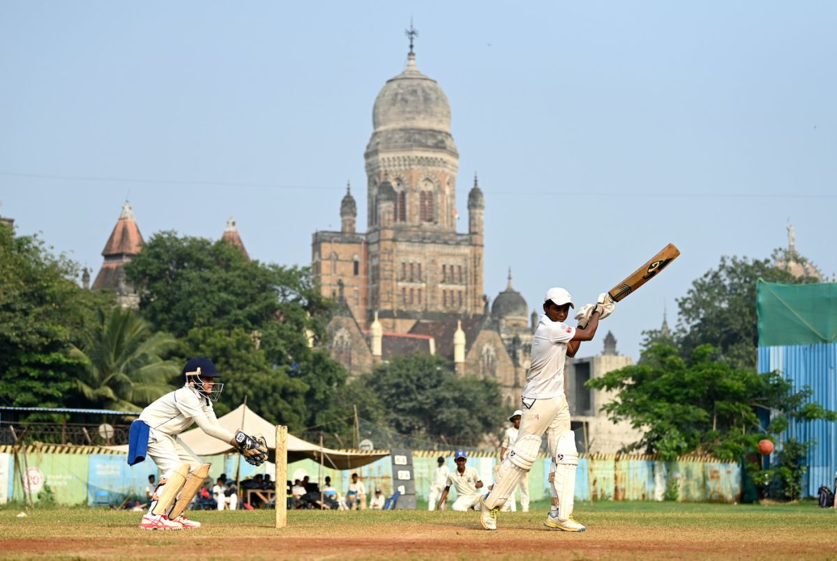 On the up, through cover goes a kid at Mumbai's Azad Maidan ...