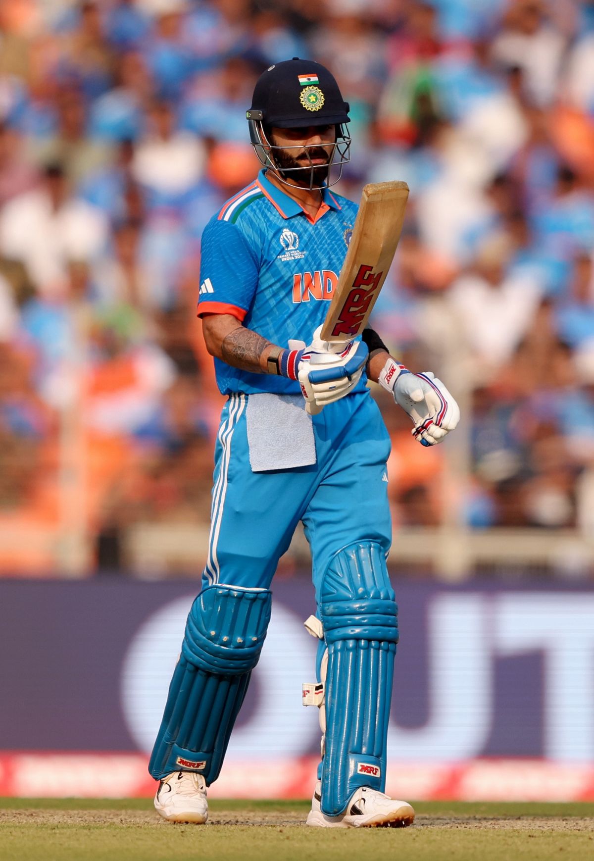 Virat Kohli has a long look at his bat after playing on | ESPNcricinfo.com