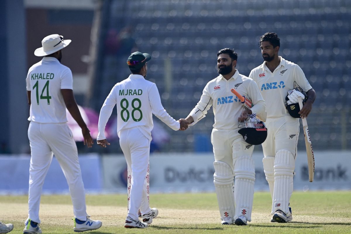 Ajaz Patel and Ish Sodhi shake hands with Hasan Murad and Khaled Ahmed ...