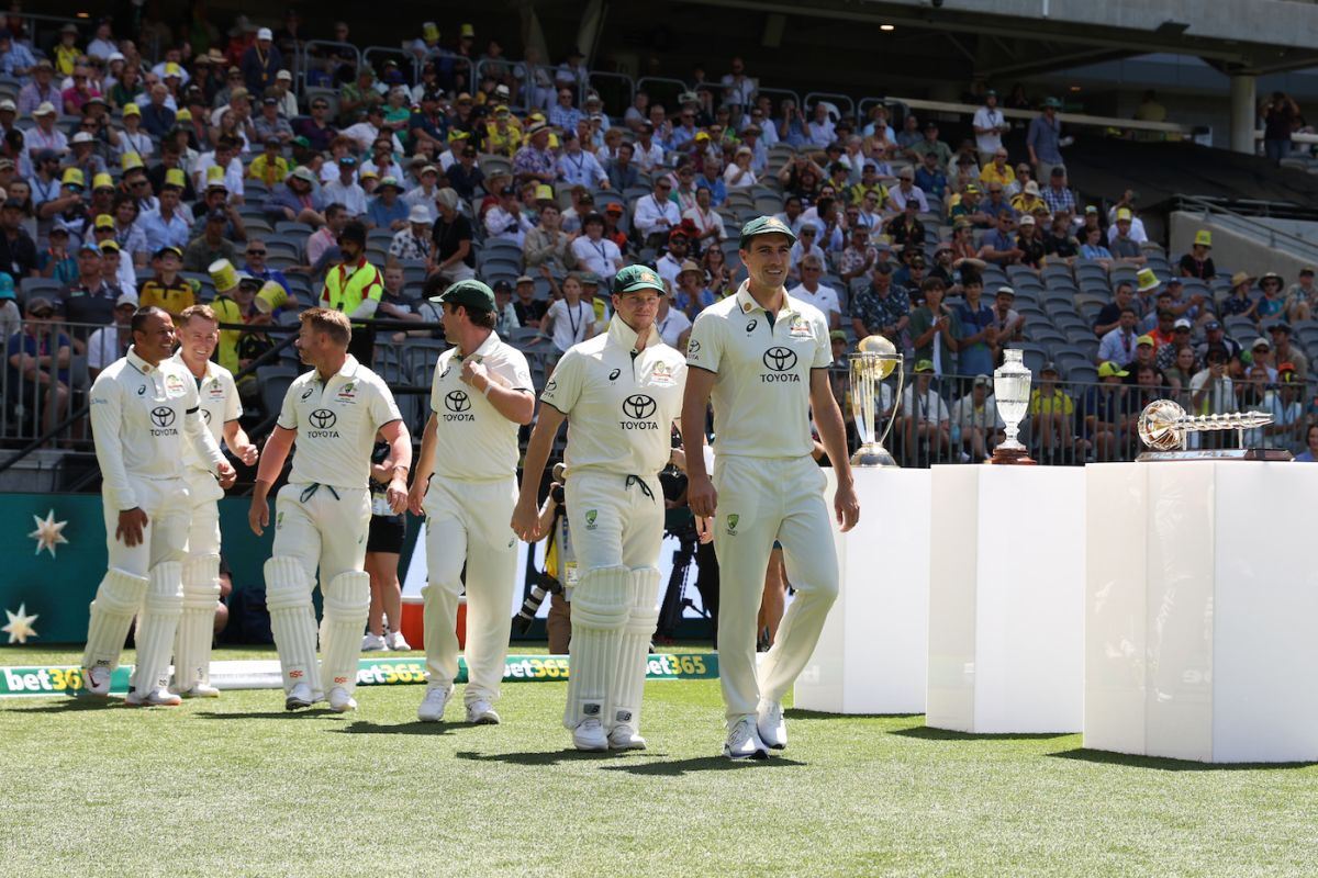 Pat Cummins leads his team past their trophies | ESPNcricinfo.com