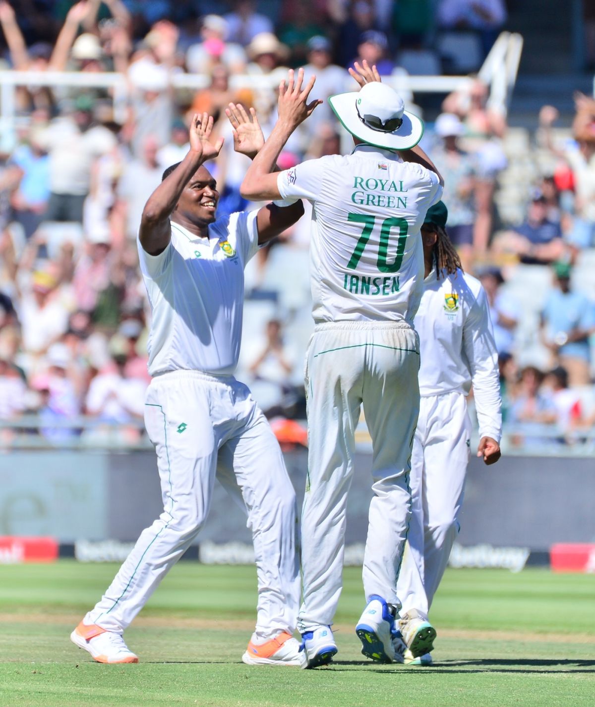 Lungi Ngidi celebrates with Marco Jansen after the latter took a catch ...