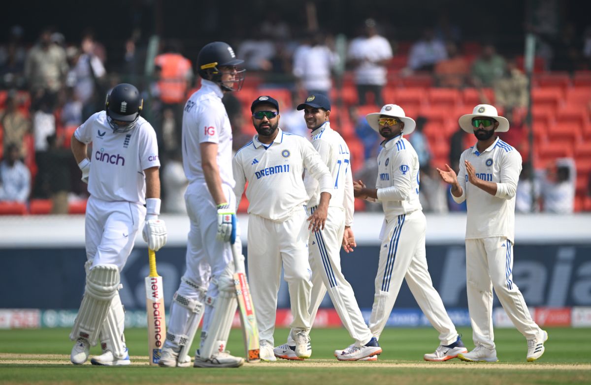 India celebrate as Zak Crawley is given out caught by the TV umpire ...