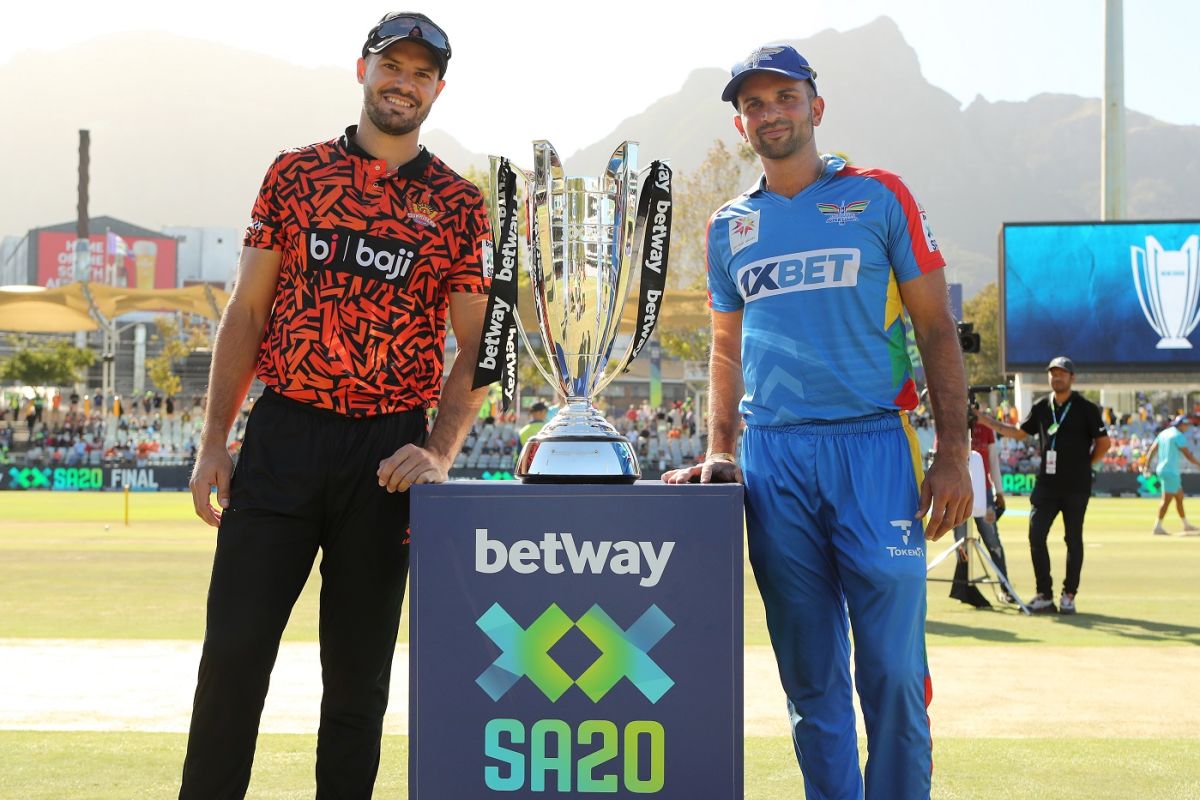 Aiden Markram and Keshav Maharaj pose with the trophy | ESPNcricinfo.com