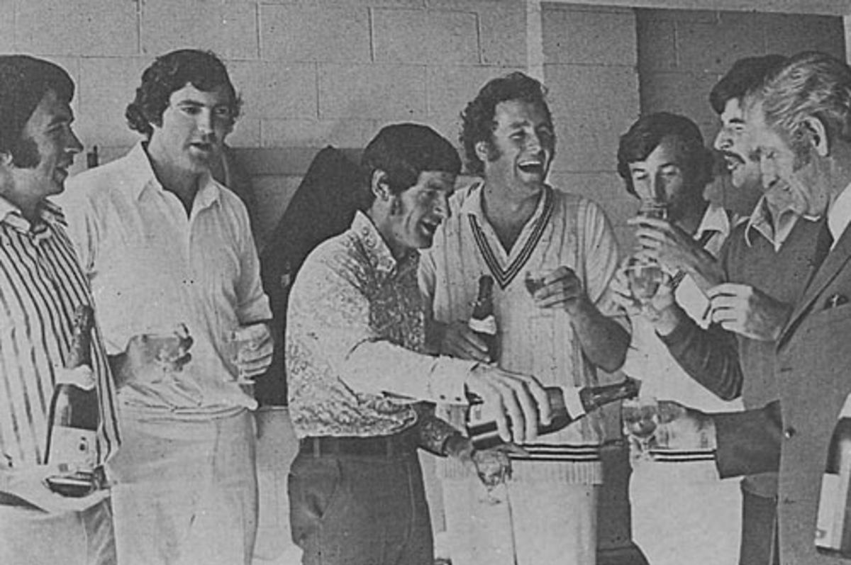 An unconscious Ewen Chatfield is stretchered off the field ...