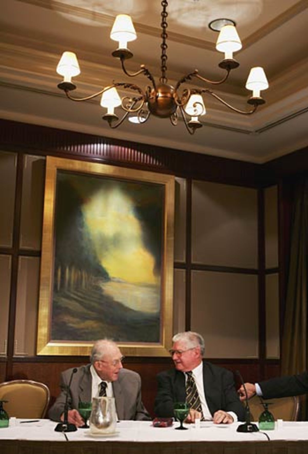 Bill Johnston and Neil Harvey talk during a reunion of the remaining ...