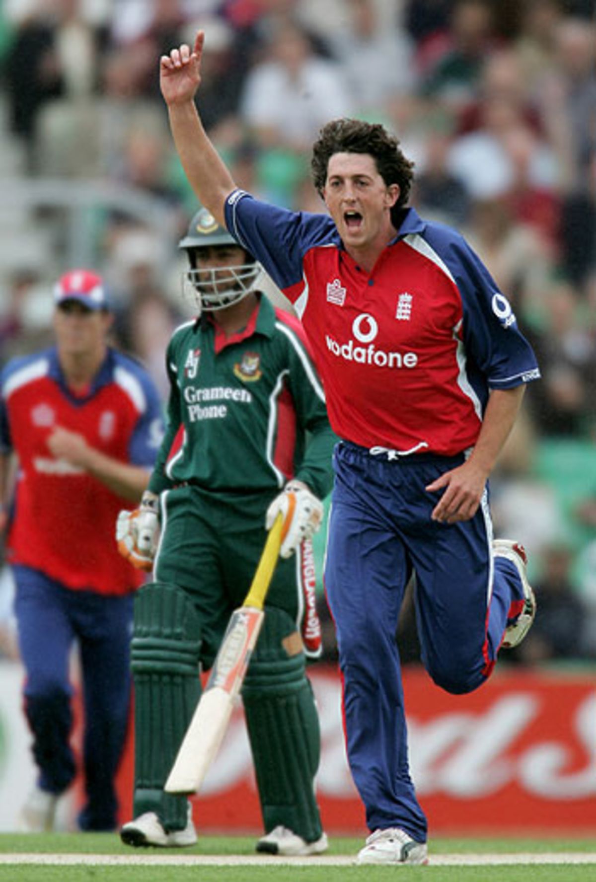 Jon Lewis claims the wicket of Javed Omar | ESPNcricinfo.com