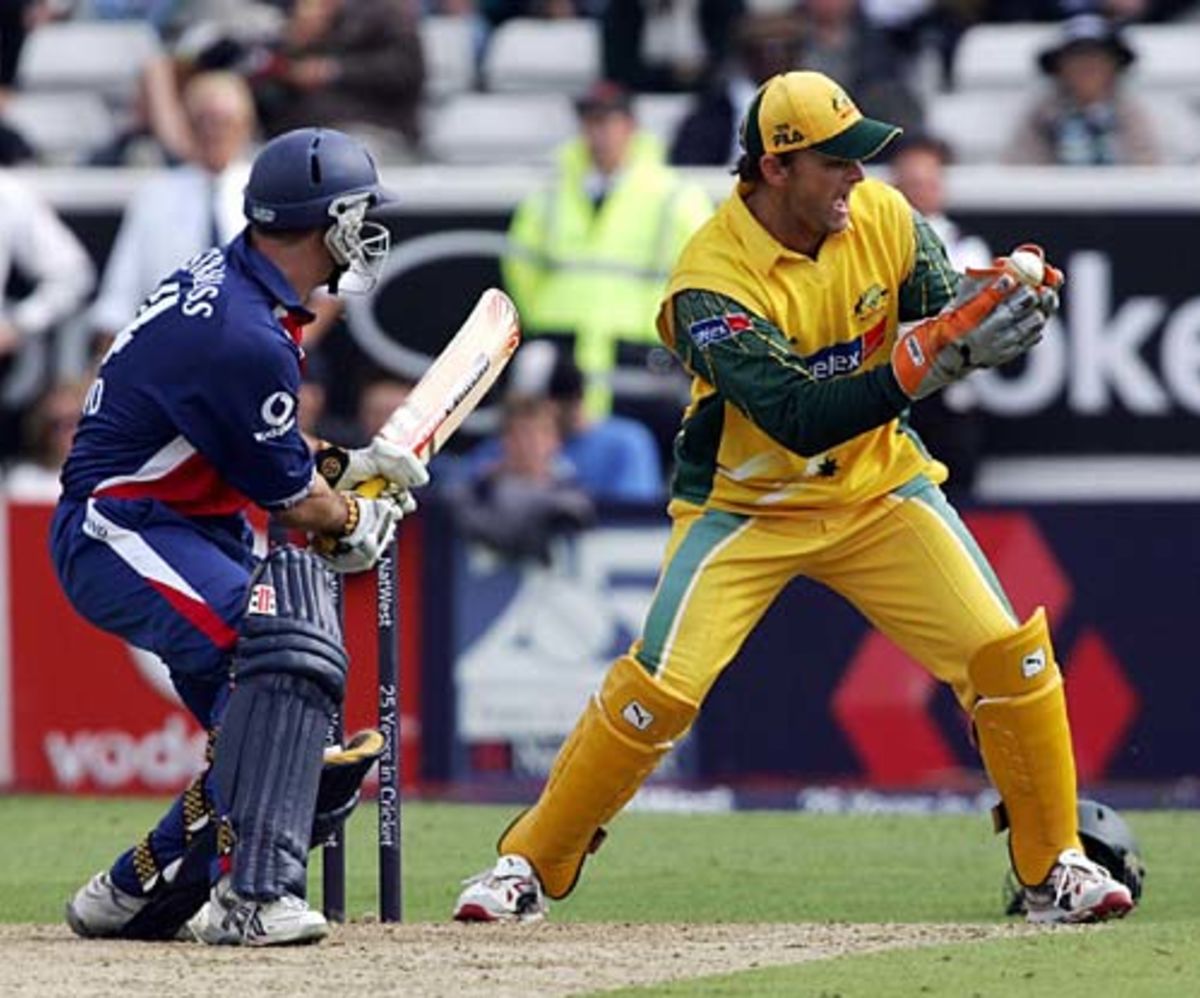 Adam Gilchrist takes a sharp catch off an Andrew Strauss reverse sweep ...