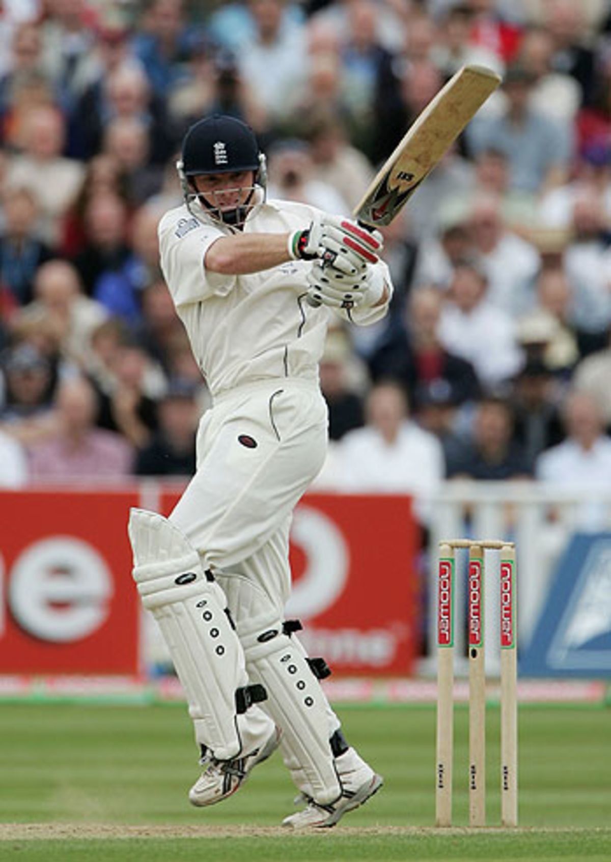 Brett Lee hares towards his team-mates as Michael Vaughan falls ...