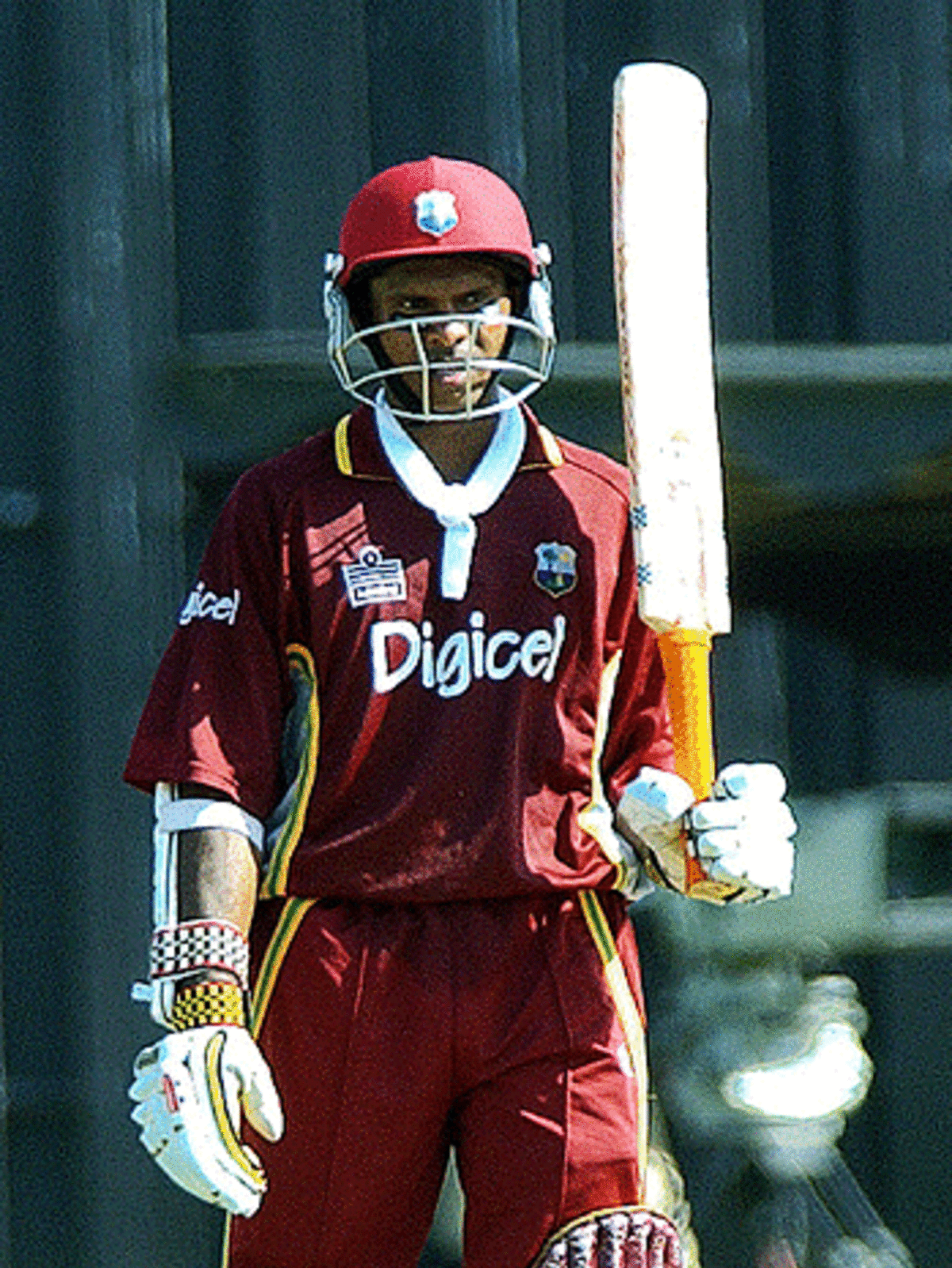 Shivnarine Chanderpaul raises his bat after reaching his fifty ...