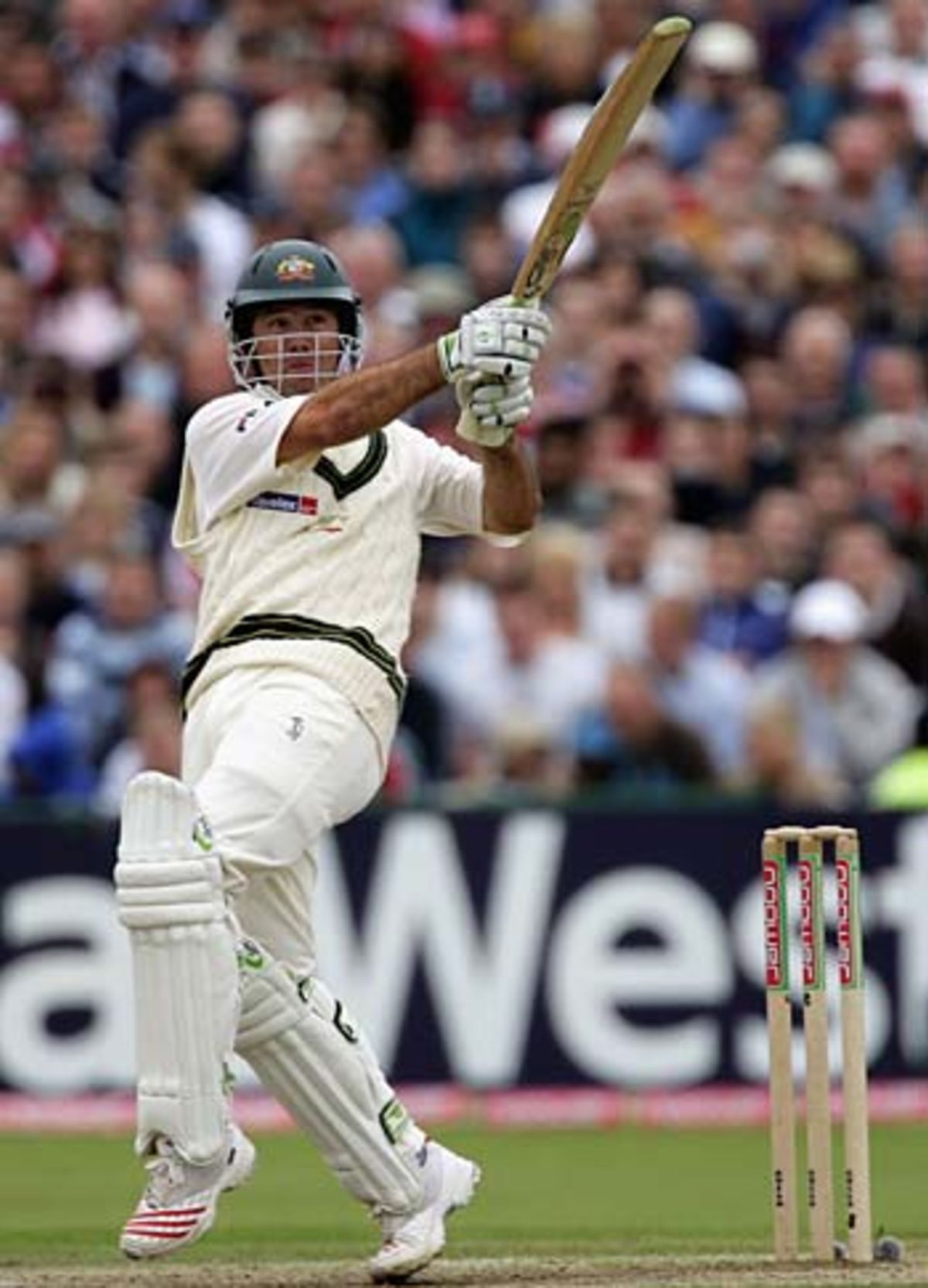 Matthew Hayden watches the ball trickle past his off stump ...