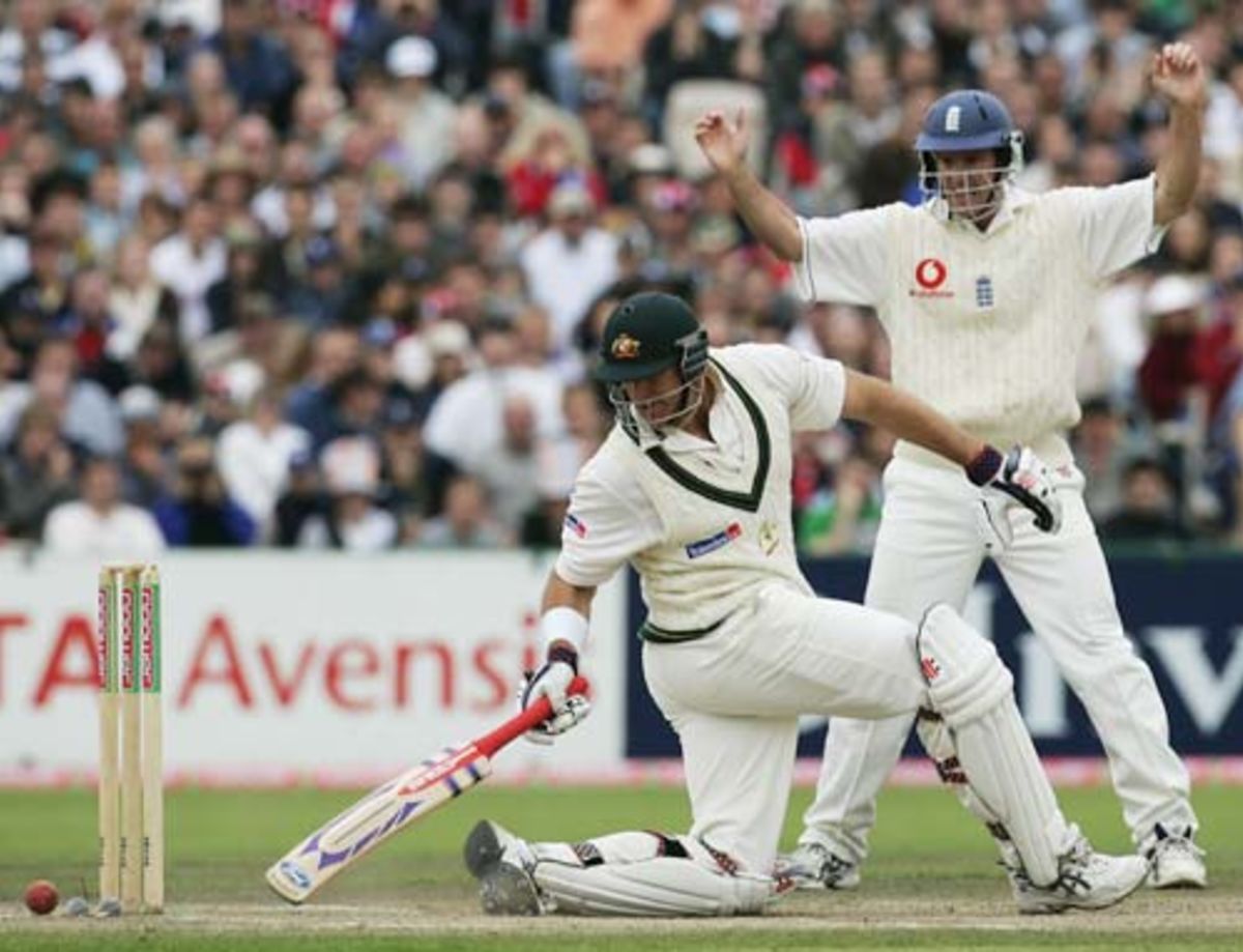 Matthew Hayden watches the ball trickle past his off stump ...