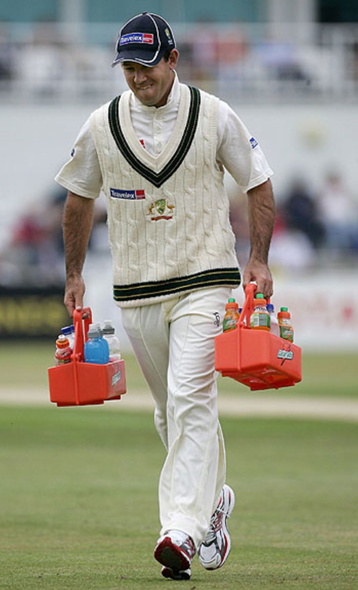 Ricky Ponting runs drinks from the field during the tour match against ...