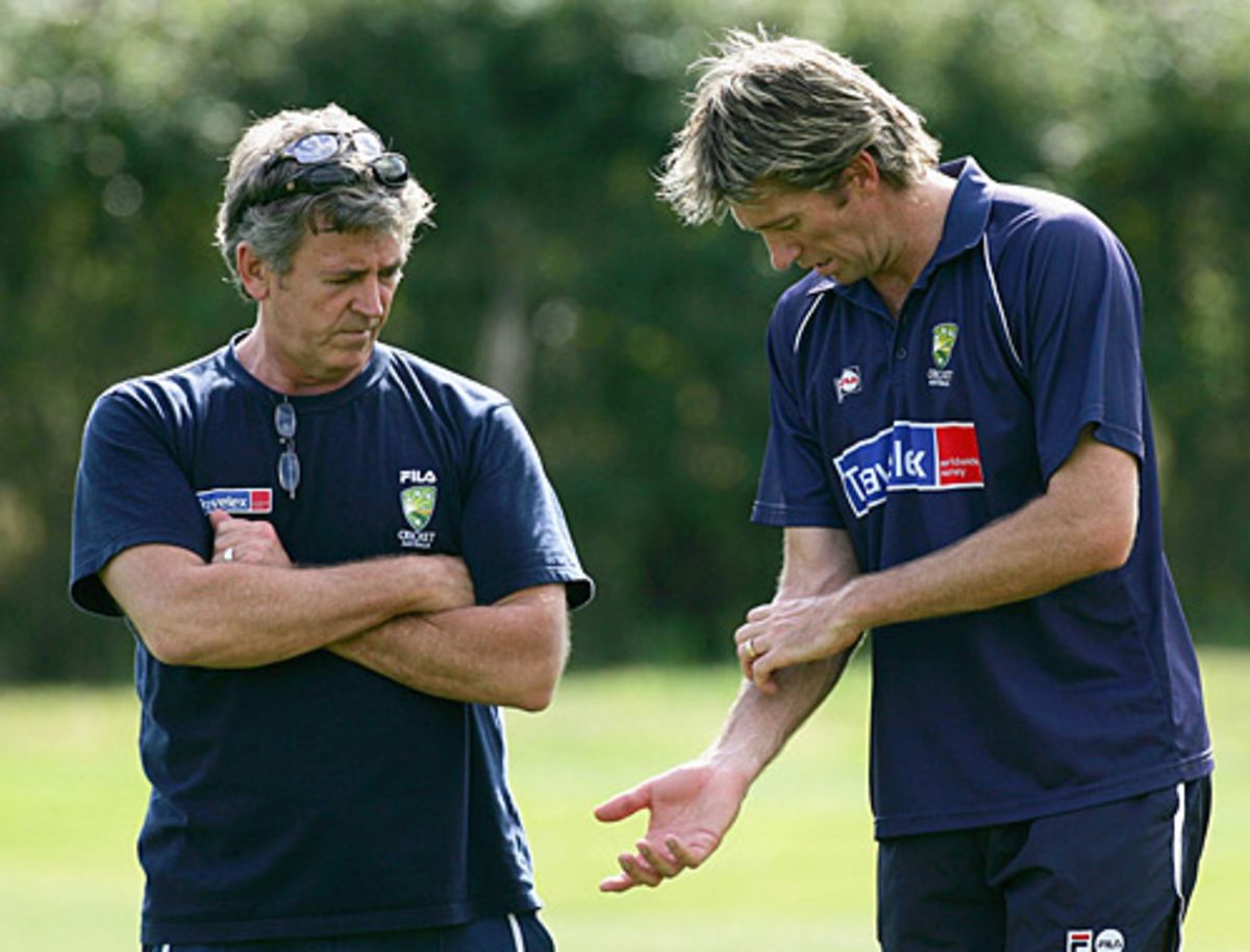 Glenn McGrath shows Errol Alcott his sore elbow | ESPNcricinfo.com