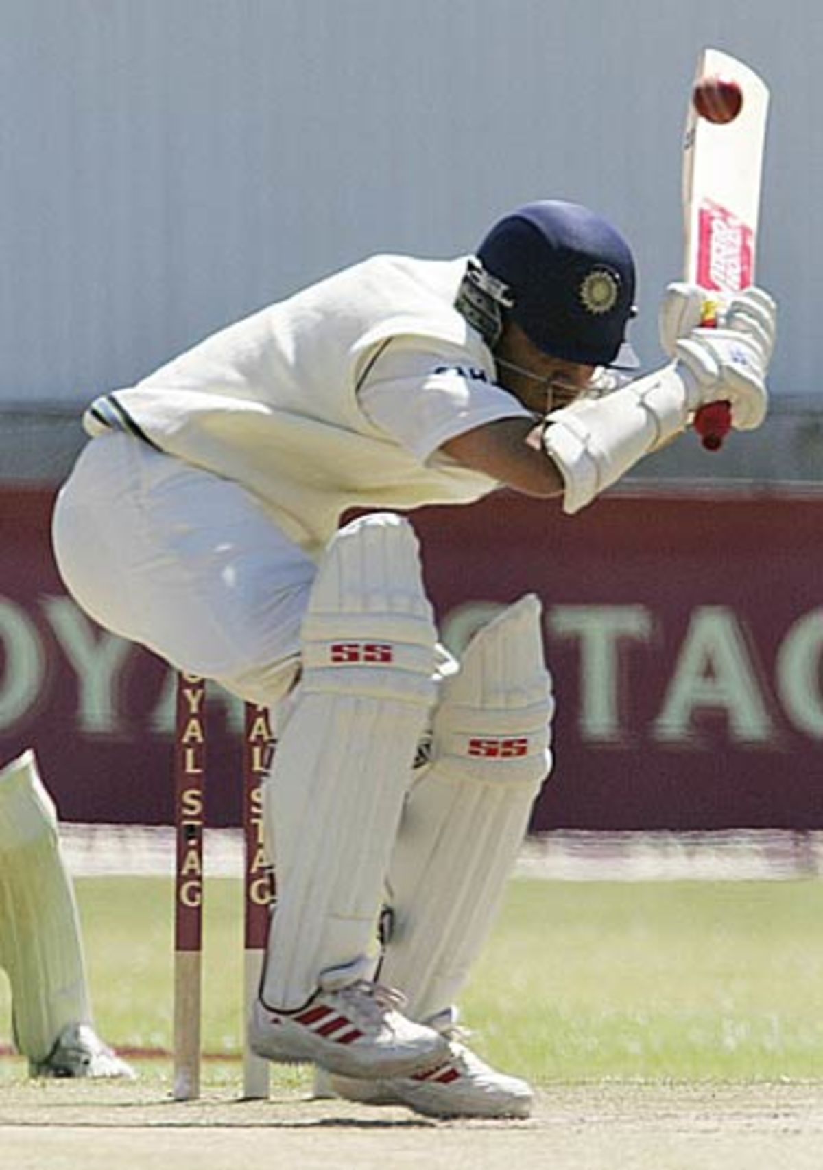 Sourav Ganguly's bat pokes out dangerously as he takes evasive action ...