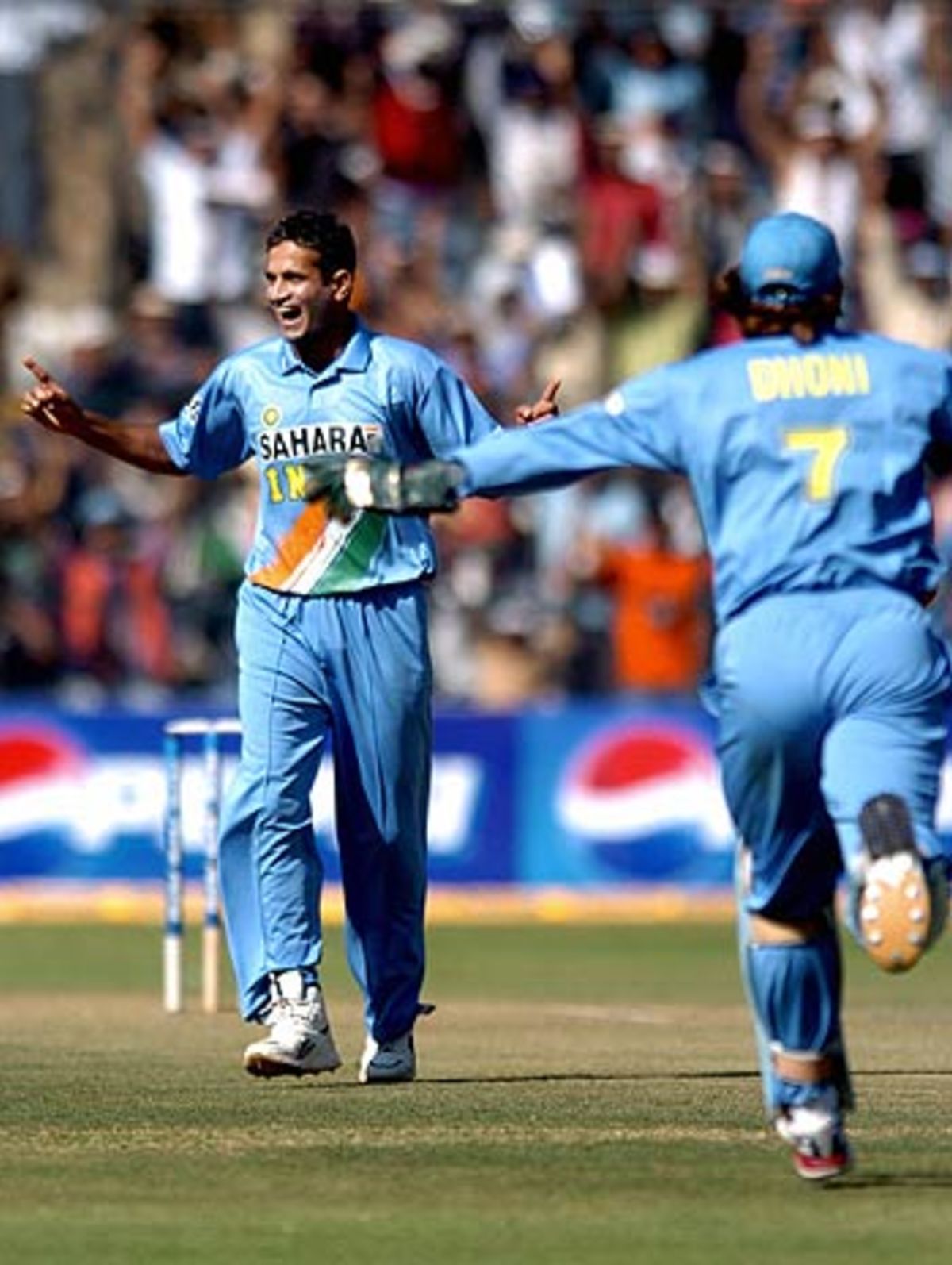 The Indian team huddles together after another wicket | ESPNcricinfo.com