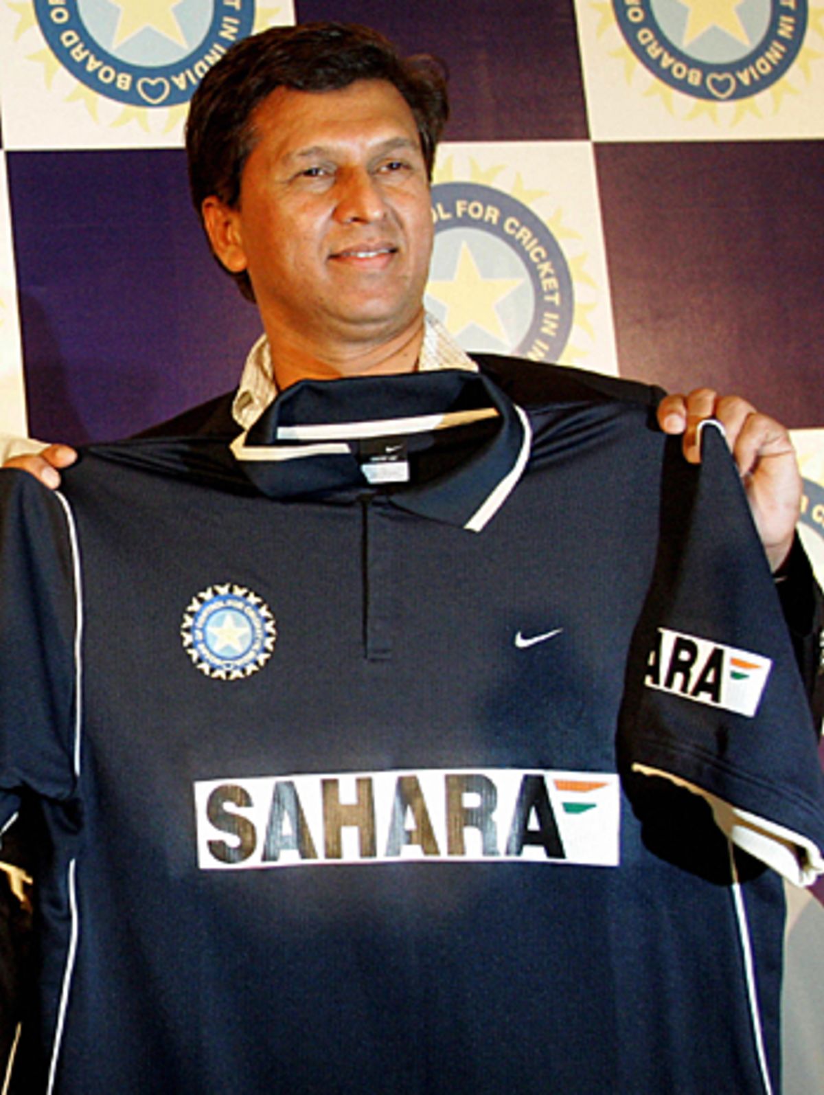 Kiran More poses with the new Indian one-day kit | ESPNcricinfo.com