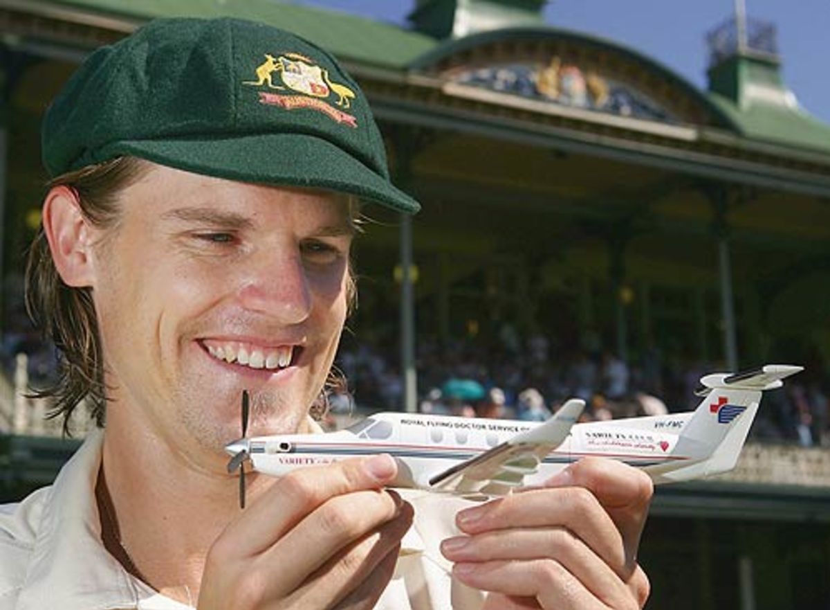Nathan Bracken poses with a model of The Royal Flying Doctors plane ...
