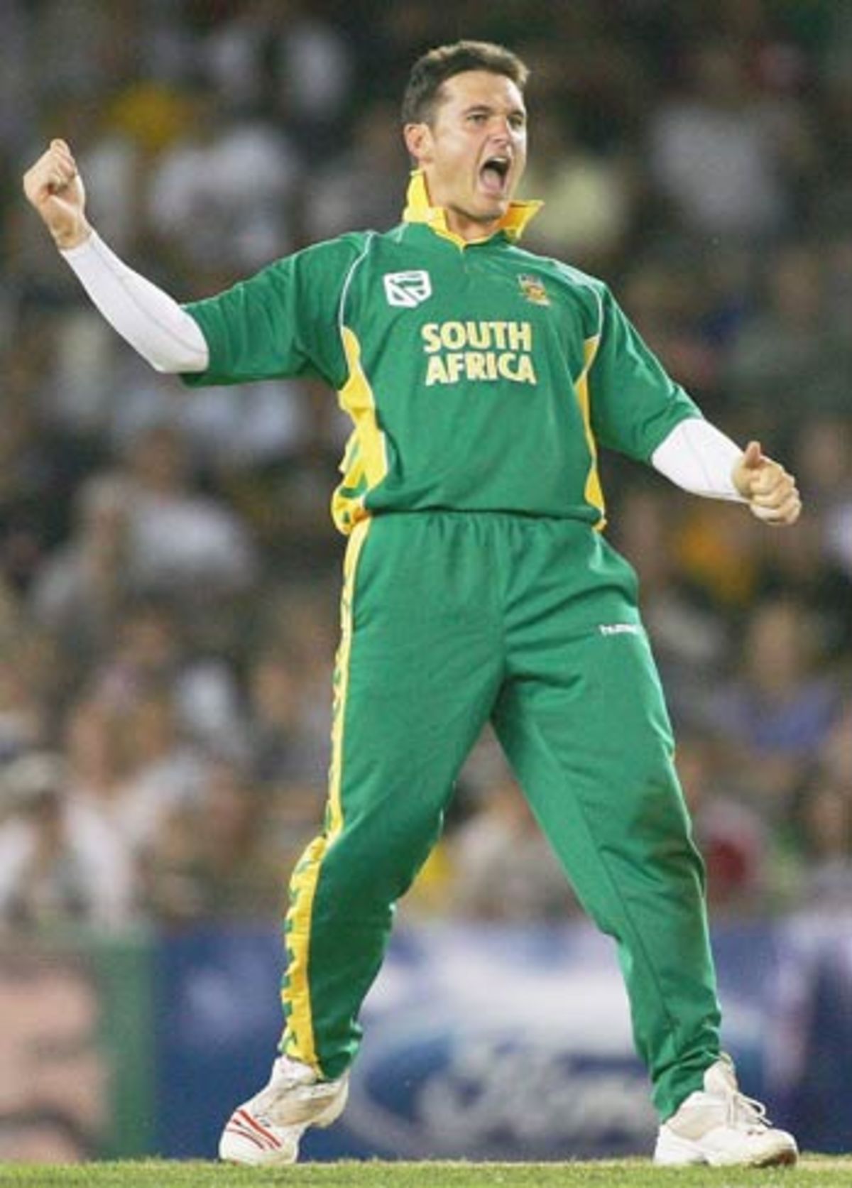 Herschelle Gibbs goes for a big slog and loses his stumps ...