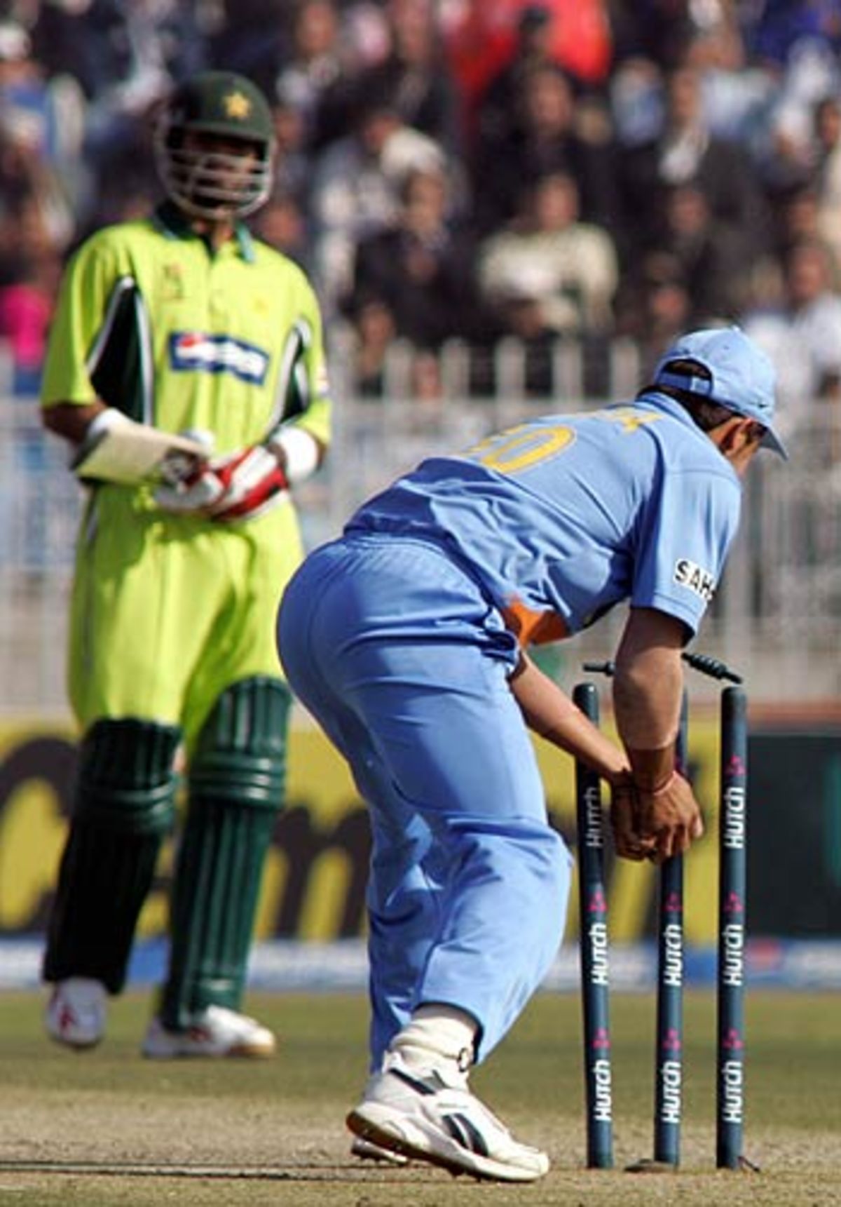 Irfan Pathan is delighted after taking the wicket of Kamran Akmal | ESPNcricinfo.com